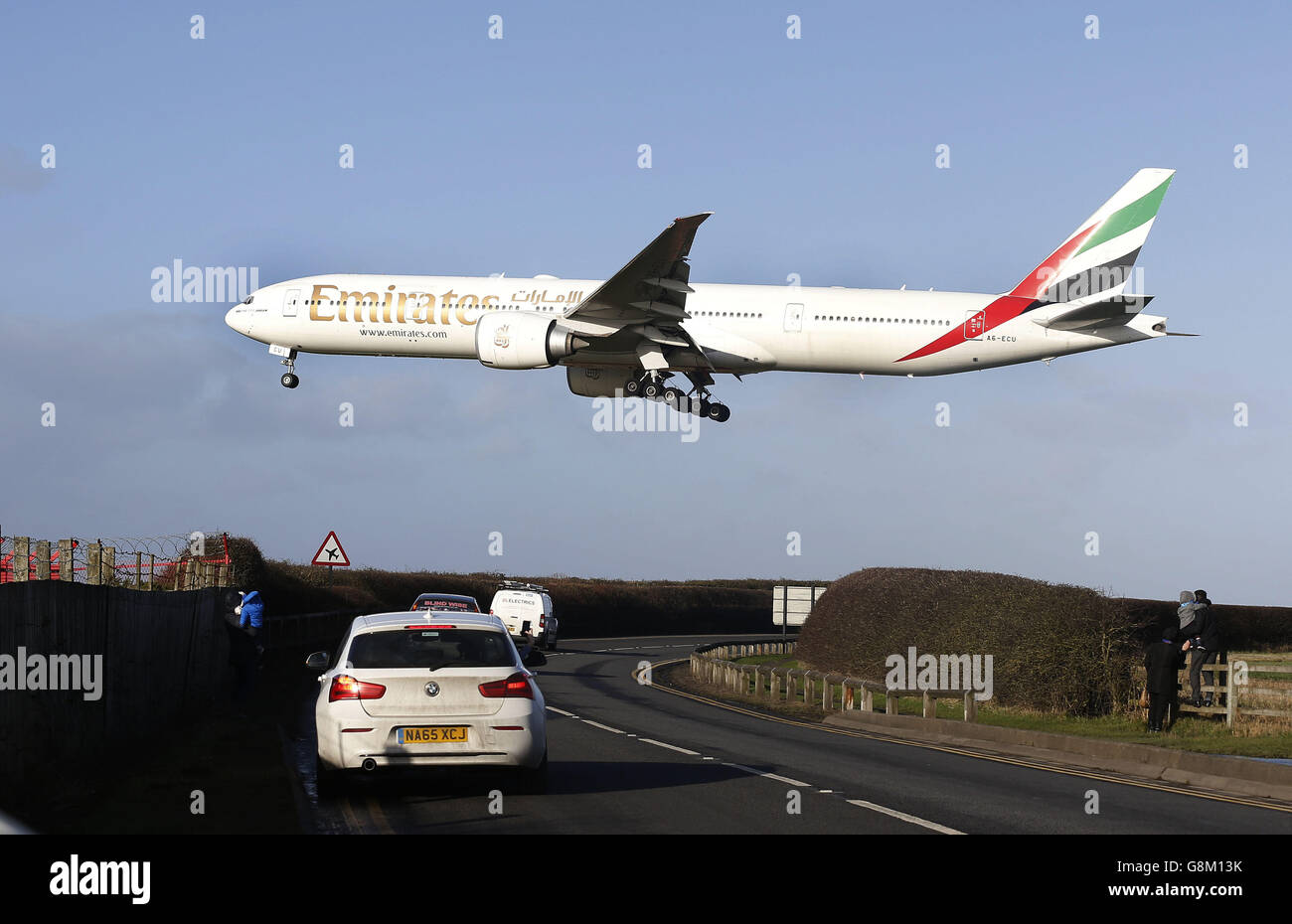 Emirates stock. An Emirates airplane landing at Newcastle airport Stock ...