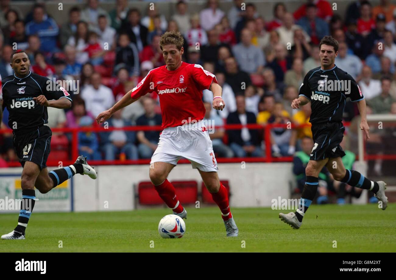 Nottingham Forest's Nicky Southall takes on the Scunthorpe United ...
