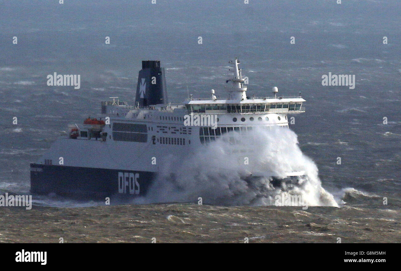 A dfds ferry is battered by waves as she arrives at the port of dover ...