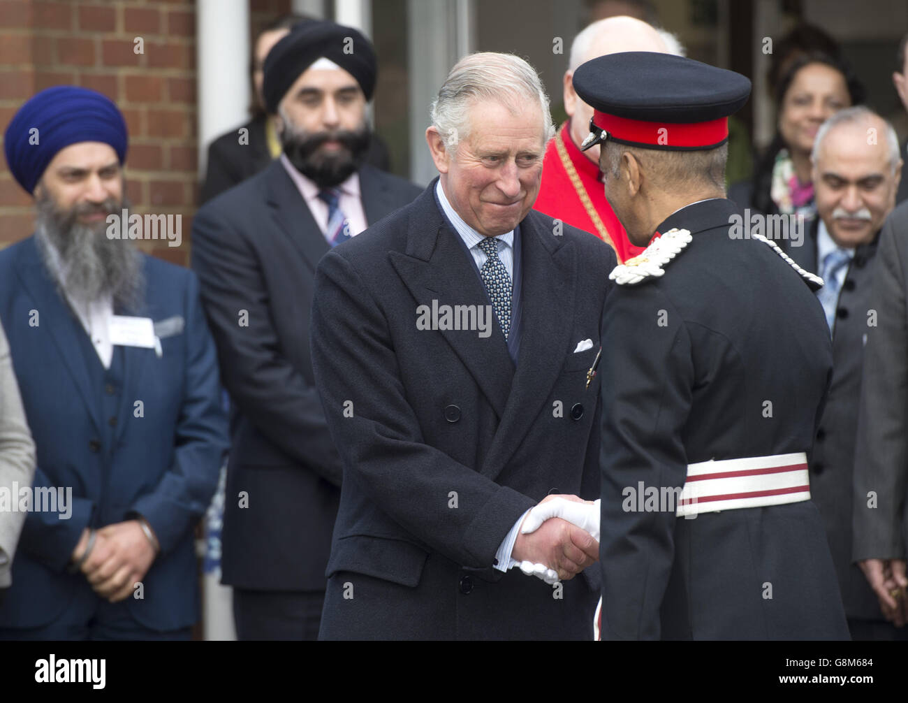 The Prince of Wales shakes hands with the Lord Lieutenant following a ...