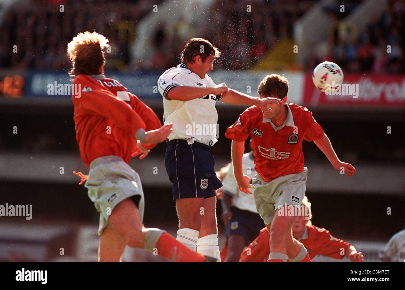 Group action orange white half football hi-res stock photography and ...