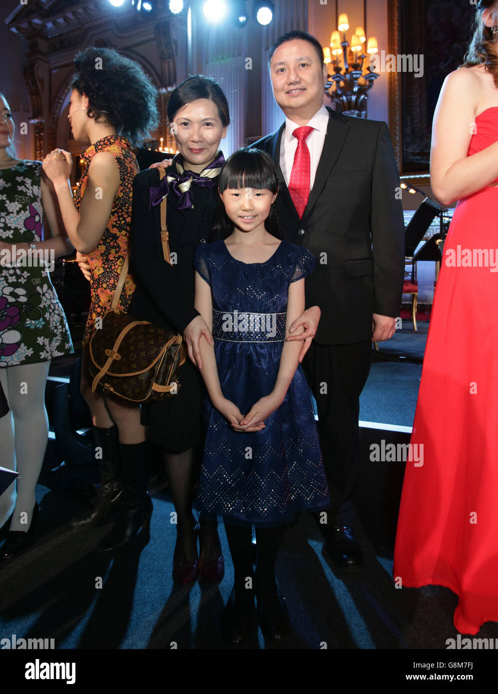 Her parents chui au and nicholas kwok hi-res stock photography and ...