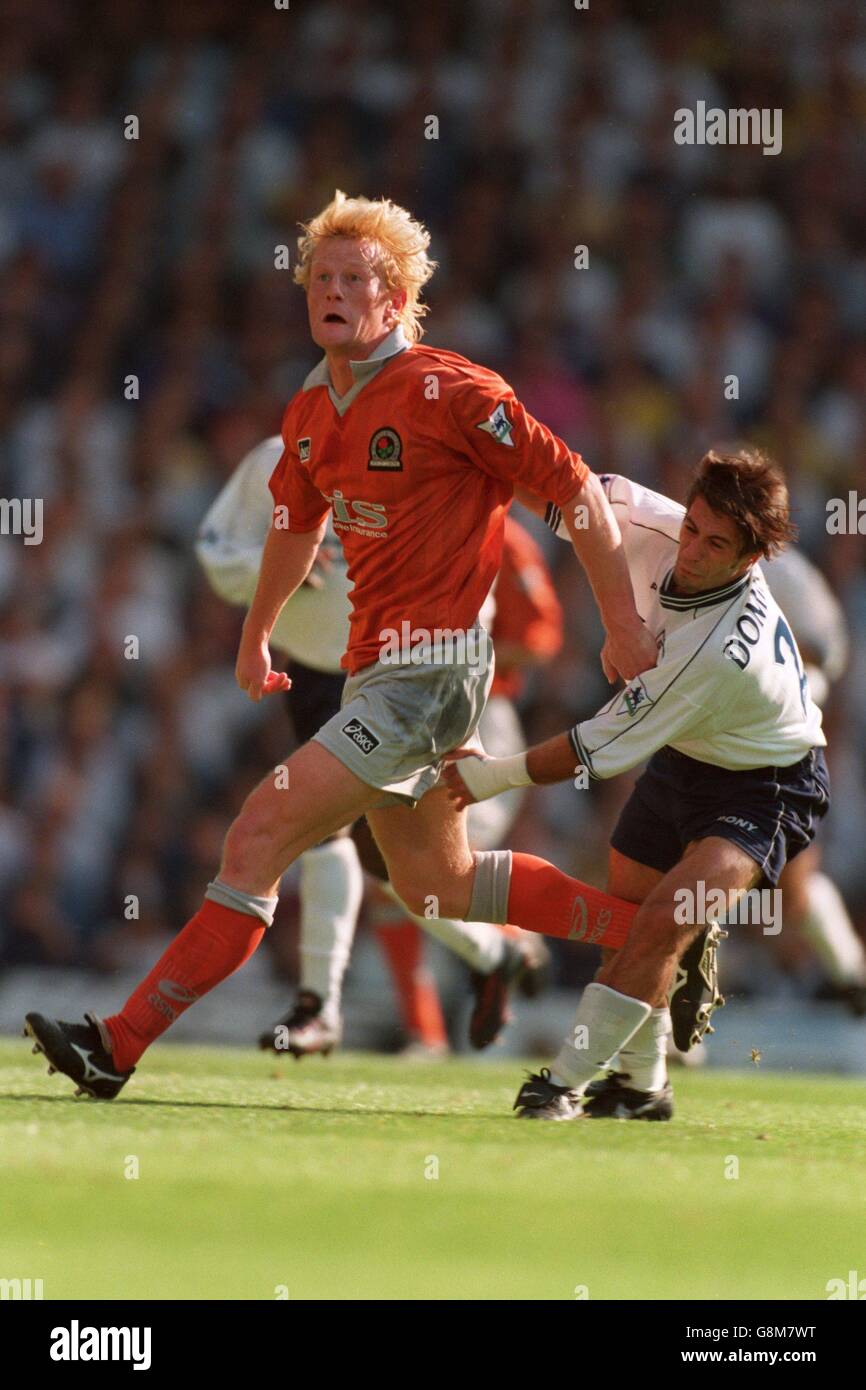 Blackburn Rovers' Colin Hendry (left) is shadowed by Tottenham Hotspur ...