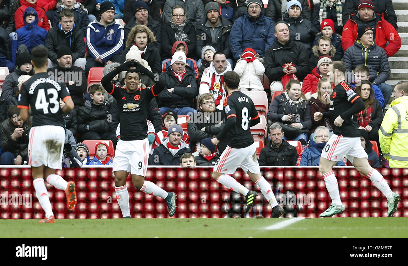 Manchester United's Anthony Martial (second left) celebrates with his ...