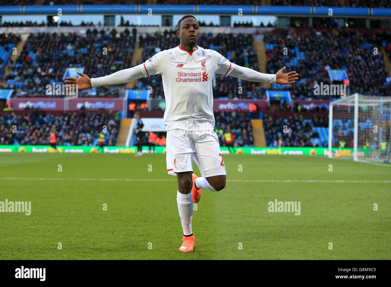 Liverpool's Divock Origi celebrates scoring his side's fourth goal ...