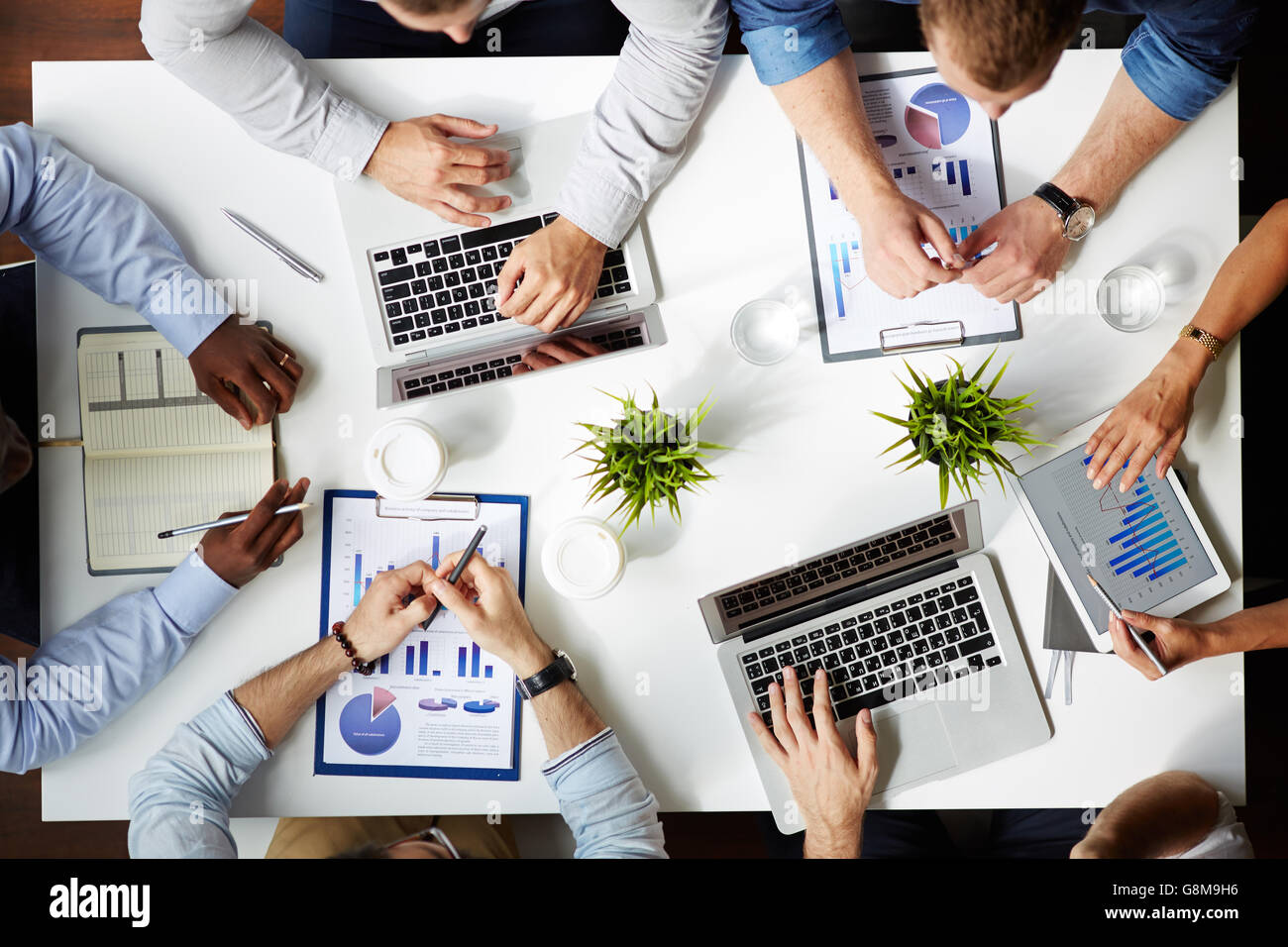 Employees at work Stock Photo - Alamy