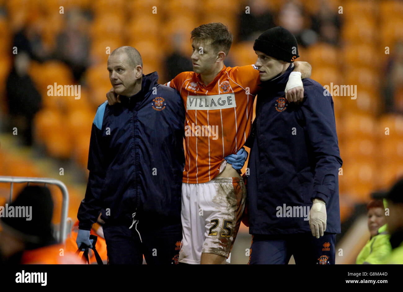Blackpool's Will Aimson goes off after suffering an injury Stock Photo ...