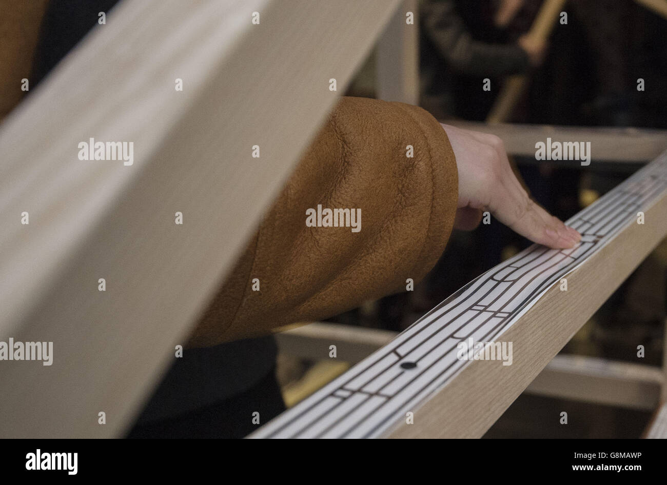 A member of the public uses part of the Polyphonic Playground, a sound ...