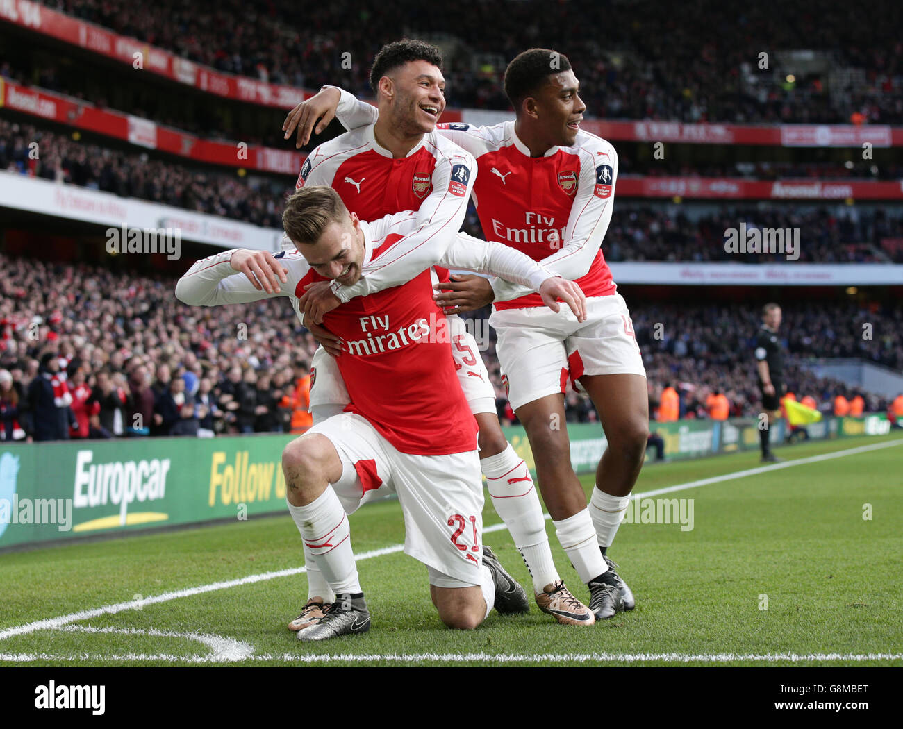 Arsenal's Calum Chambers (bottom) celebrates after scoring against ...