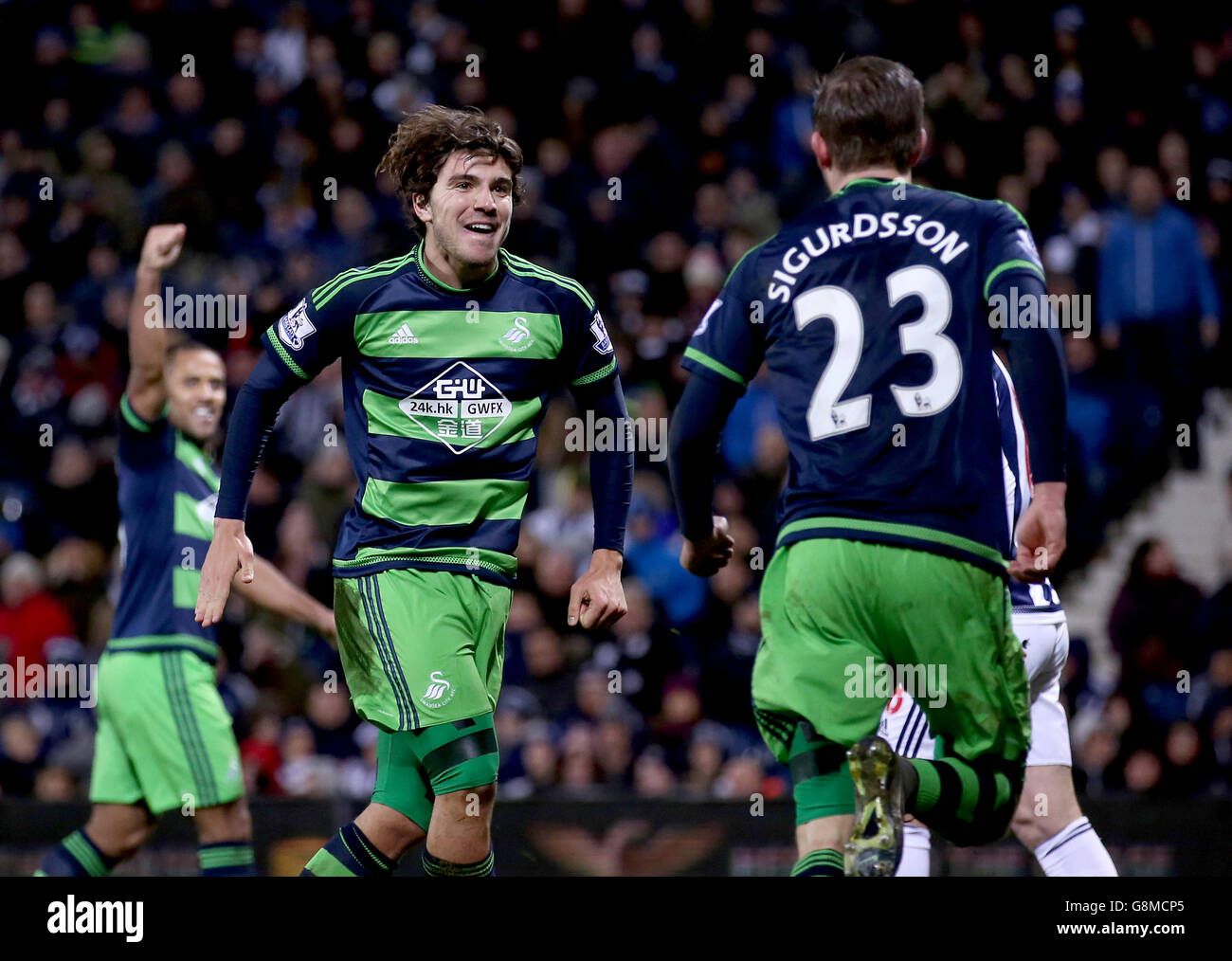 Swansea City's Gylfi Sigurdsson (right) celebrates scoring his side's ...