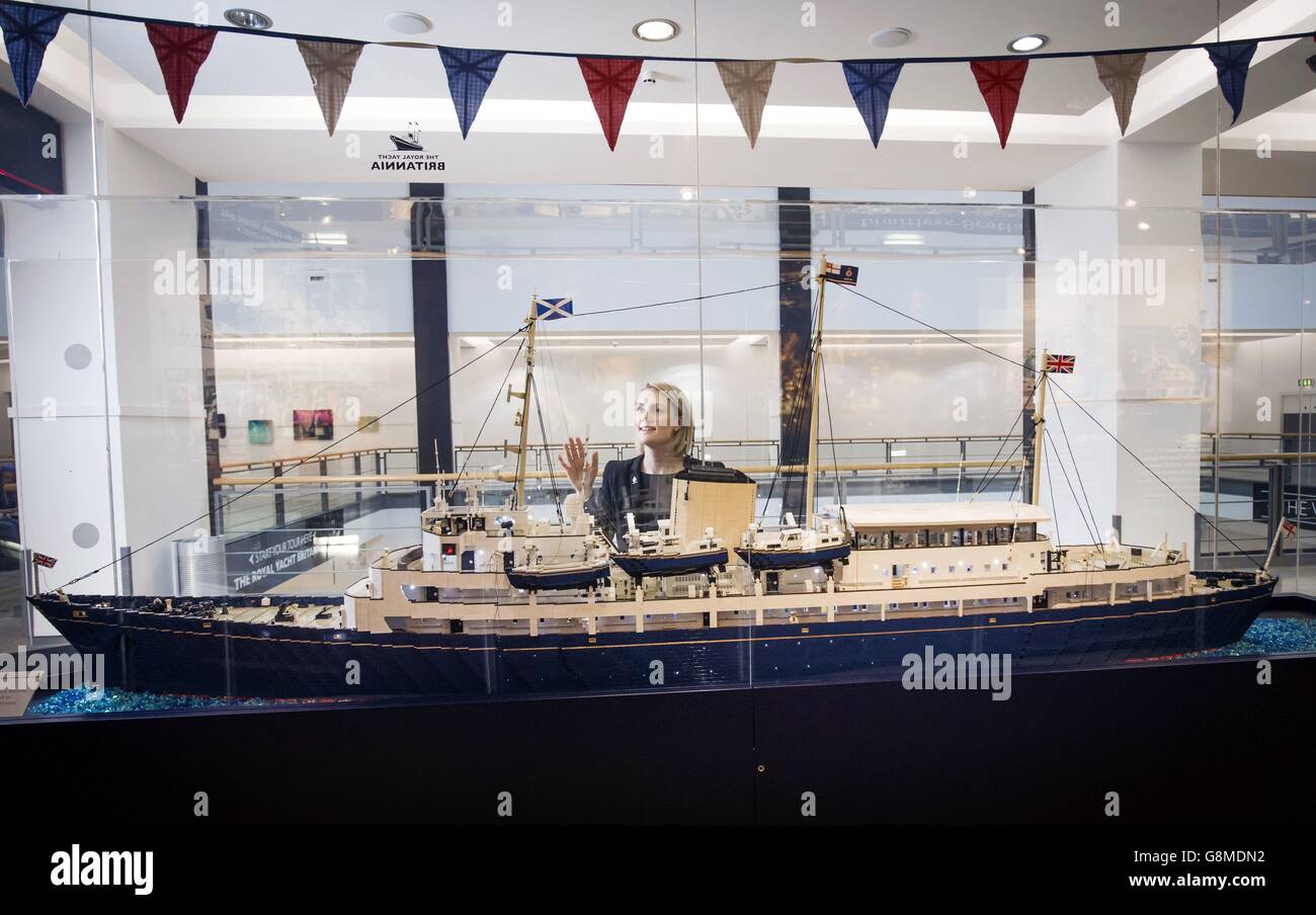 Royal Yacht Britannia employee Emma Aitken looks at a LEGO model of the ...