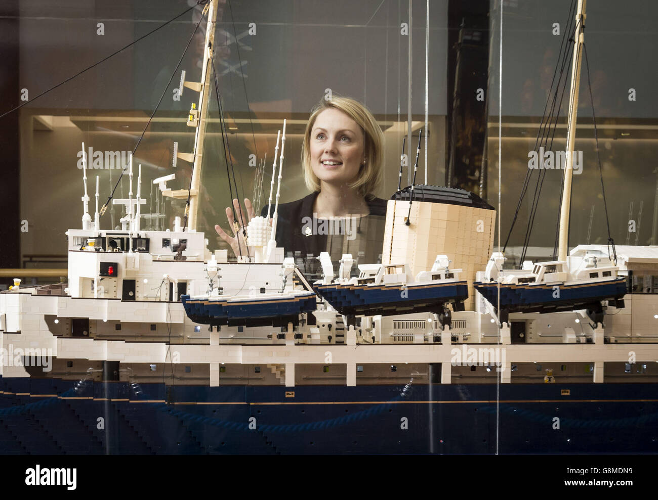Royal Yacht Britannia employee Emma Aitken looks at a LEGO model of the ...