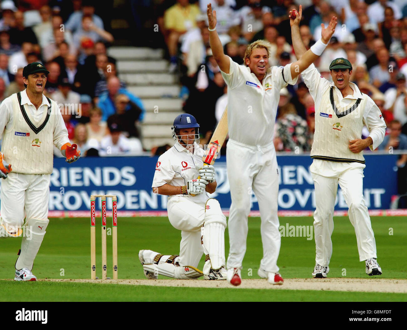 Australia's Shane Warne (centre, right) celebrates after bowling ...