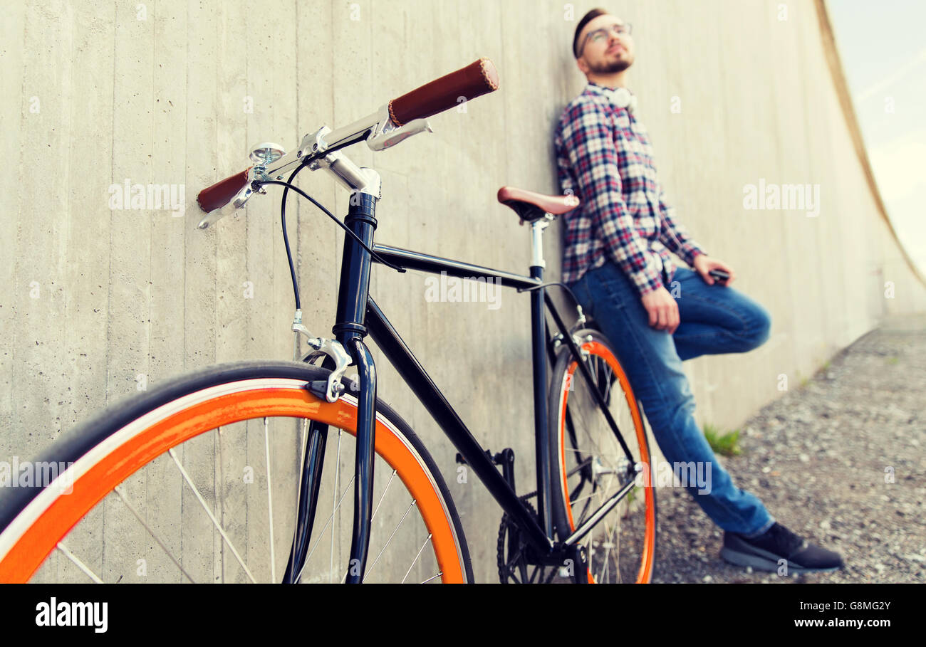 close up of hipster fixed gear bike and man Stock Photo - Alamy