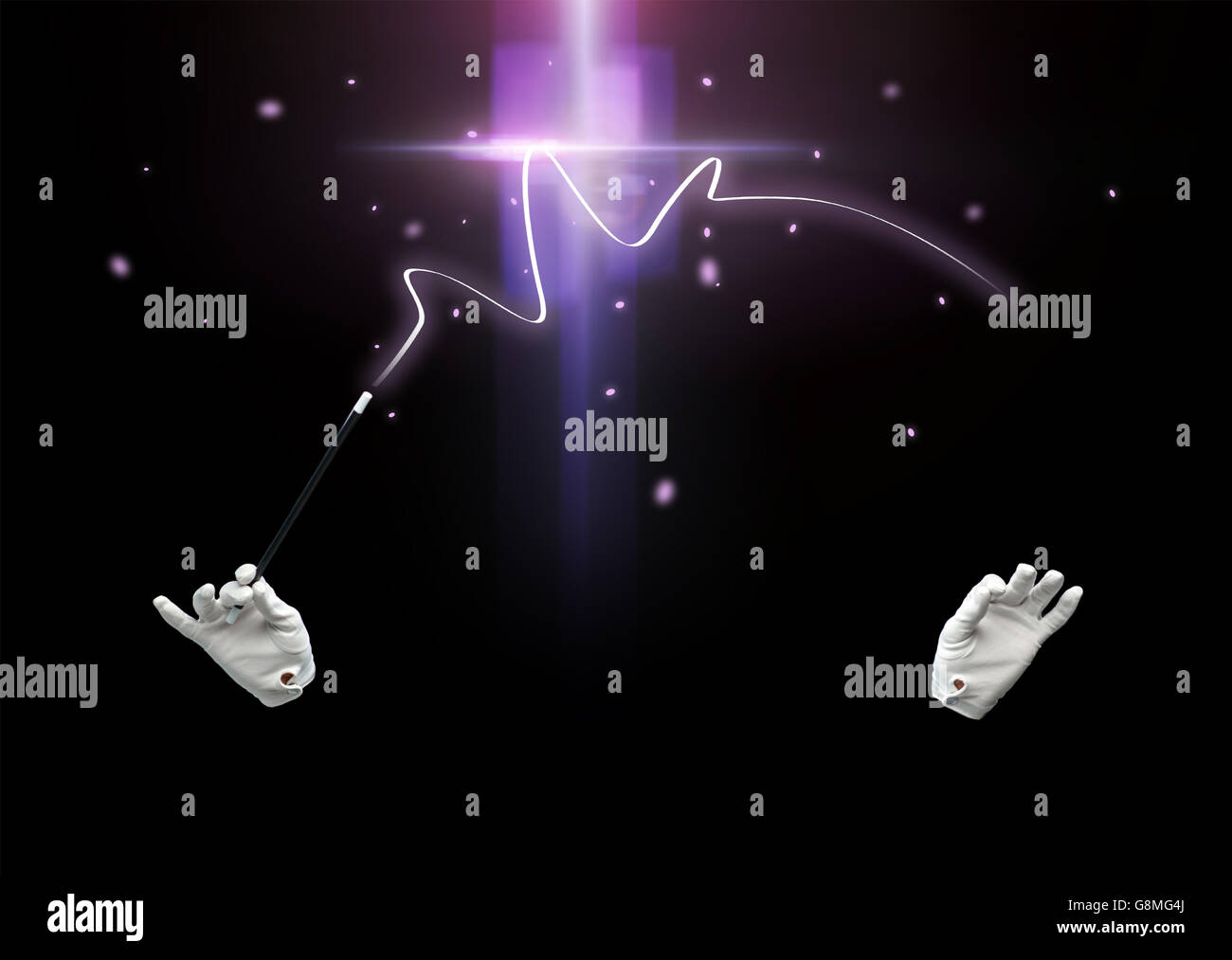 magician hands with magic wand showing trick Stock Photo - Alamy