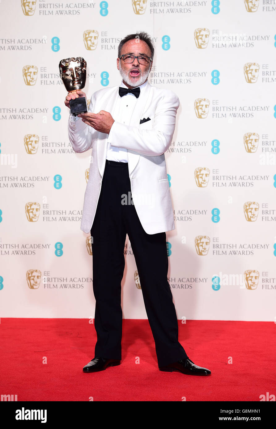 Colin Gibson poses with the Best Production Design BAFTA for 'Mad Max ...