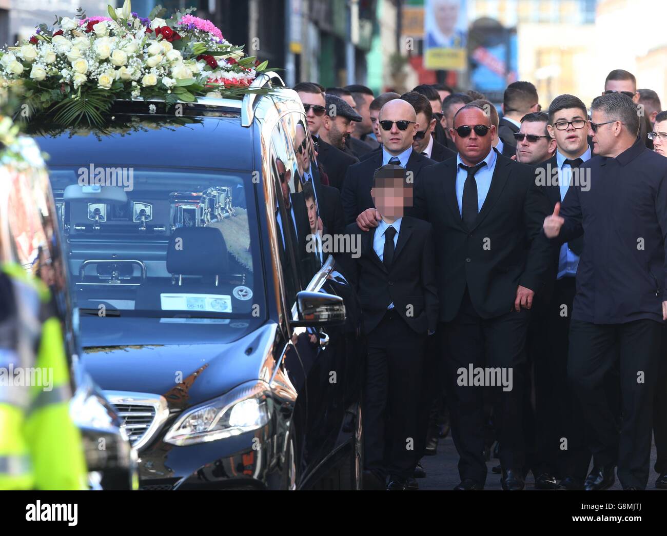 EDS NOTE IMAGE HAS BEEN PIXELATED BY PA PICTURE DESK The funeral of ...