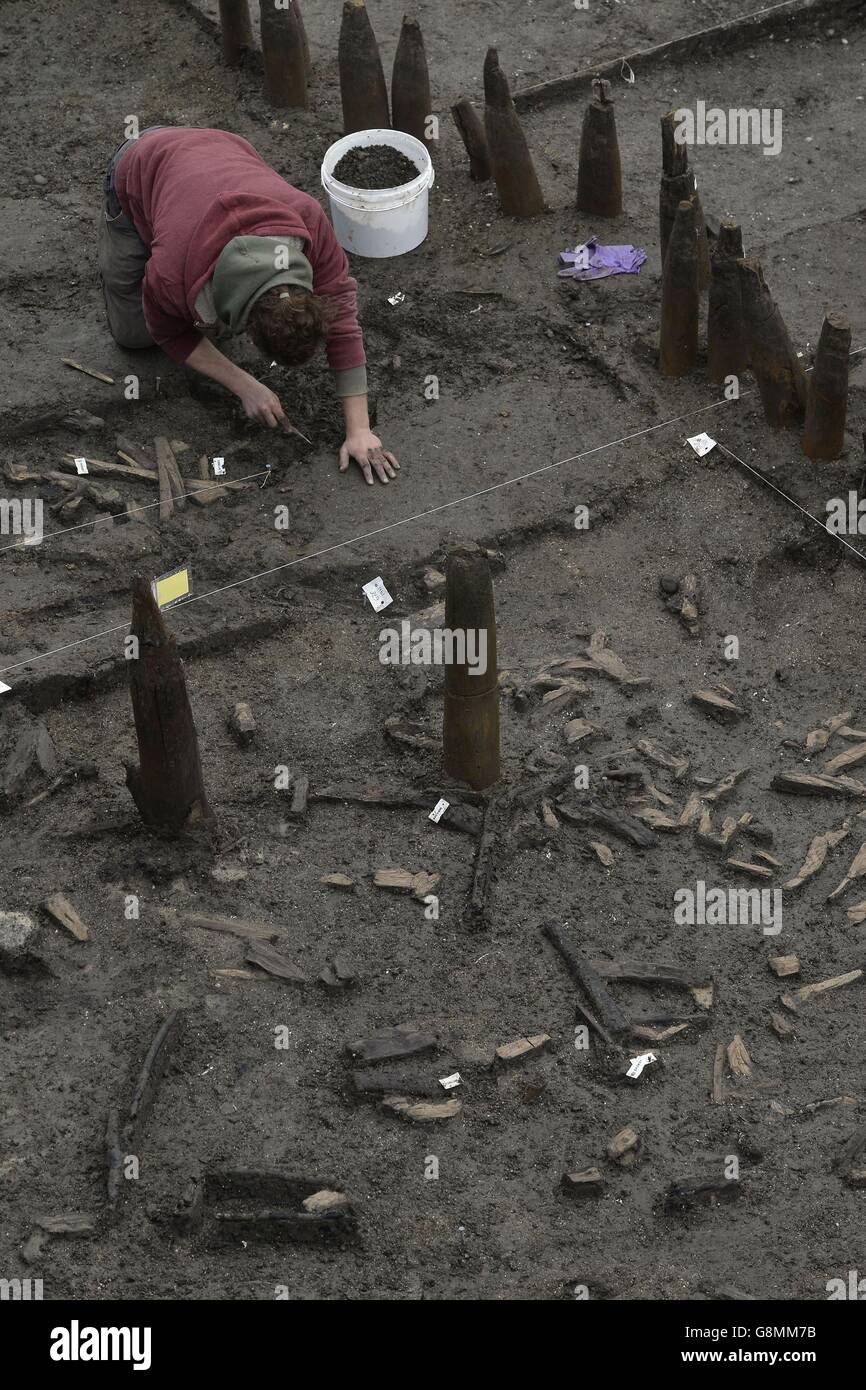 Archaeologists work on the Must Farm site near Peterborough in ...