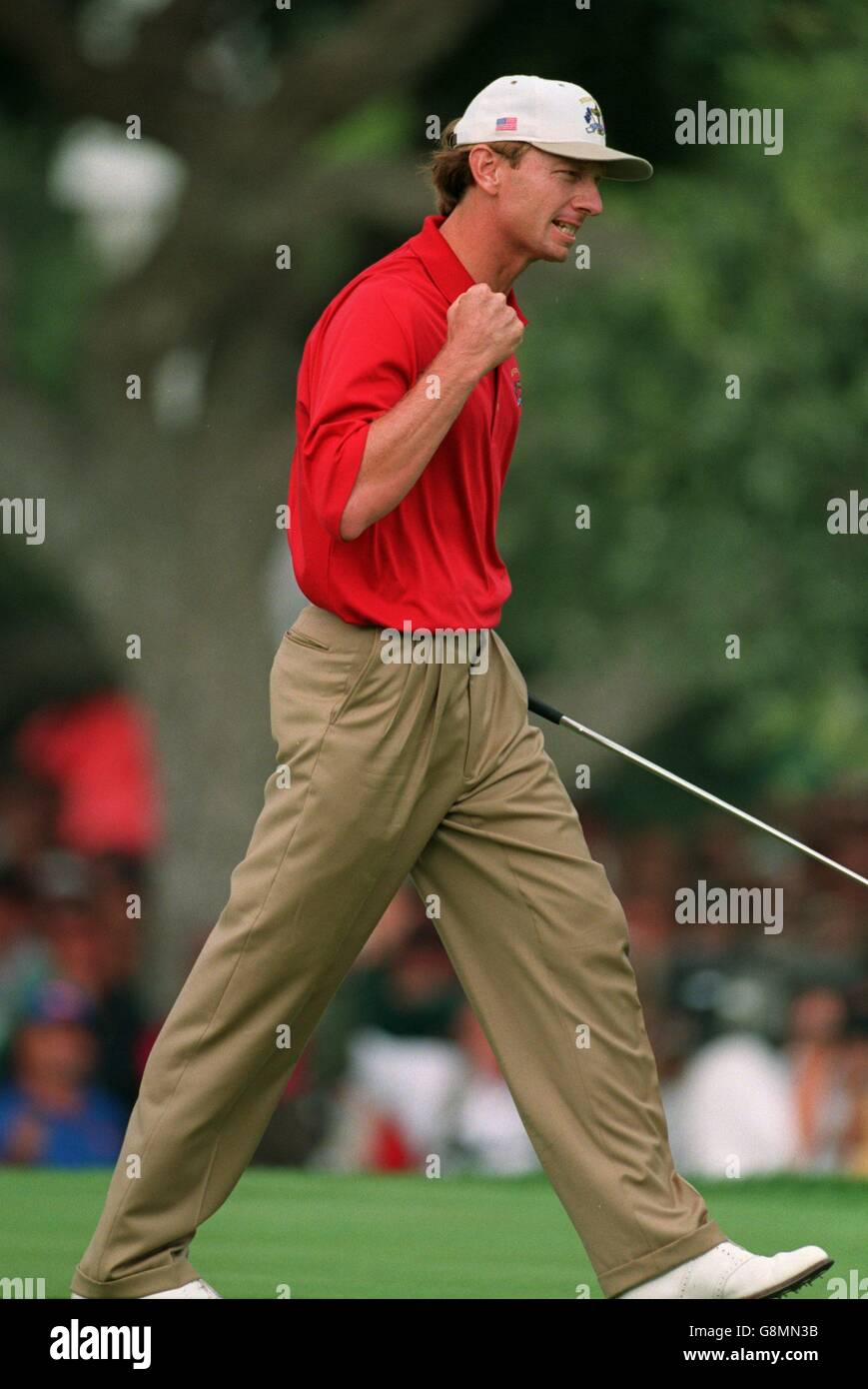 USA's Brad Faxon celebrates sinking the decisive putt on the 18th green ...