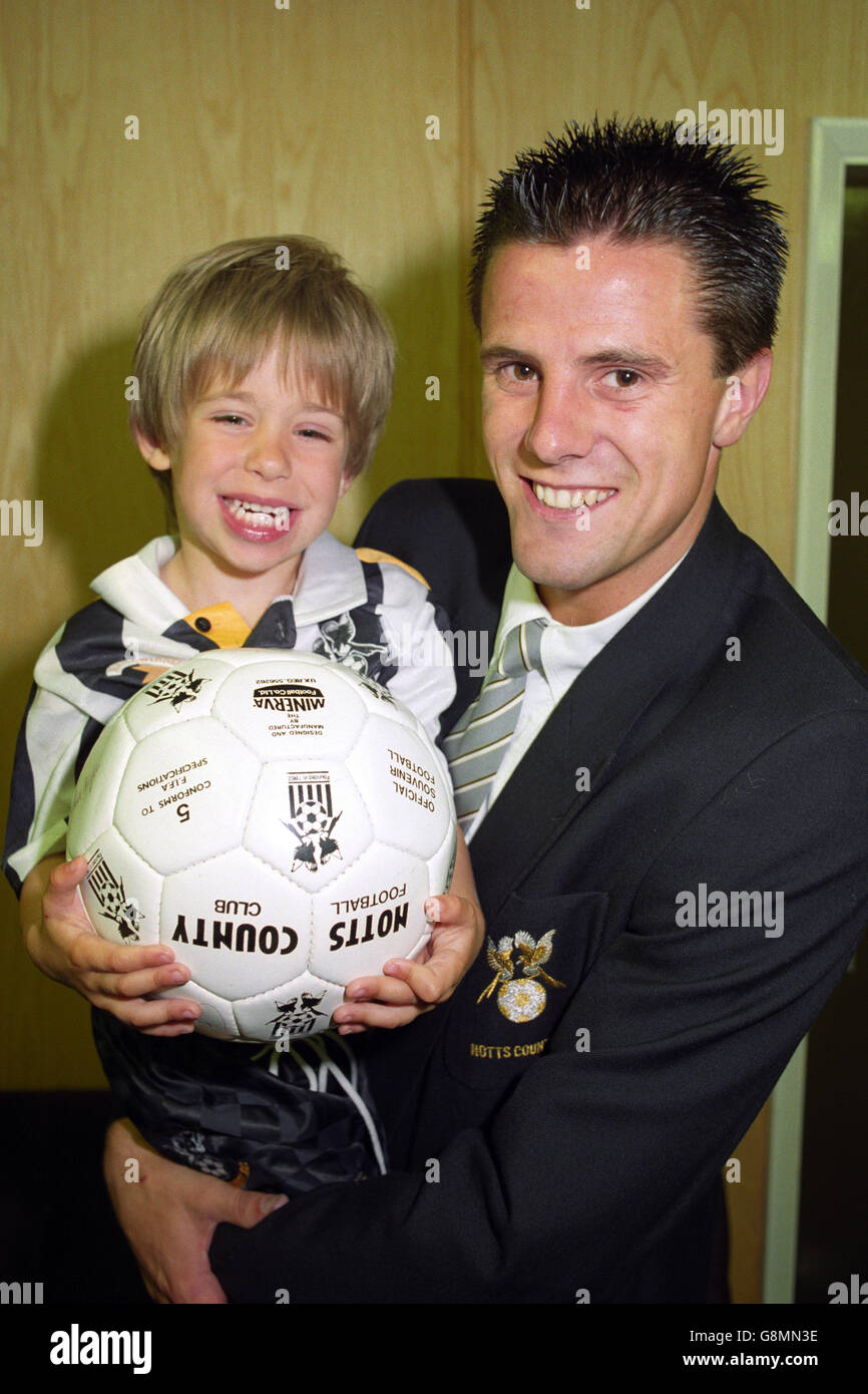 Notts countys dean yates with mascot hi-res stock photography and ...