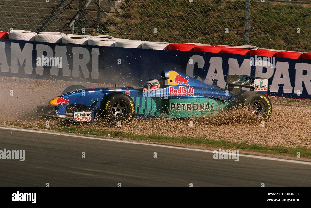 Gianni morbidelli spins off into the gravel hi-res stock photography ...