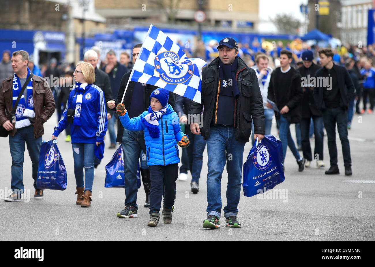 Chelsea fans make their way towards Stamford Bridge before the Emirates ...