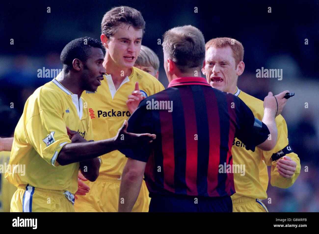 Leeds United's Lucas Radebe (left), David Wetherall (second left) and ...