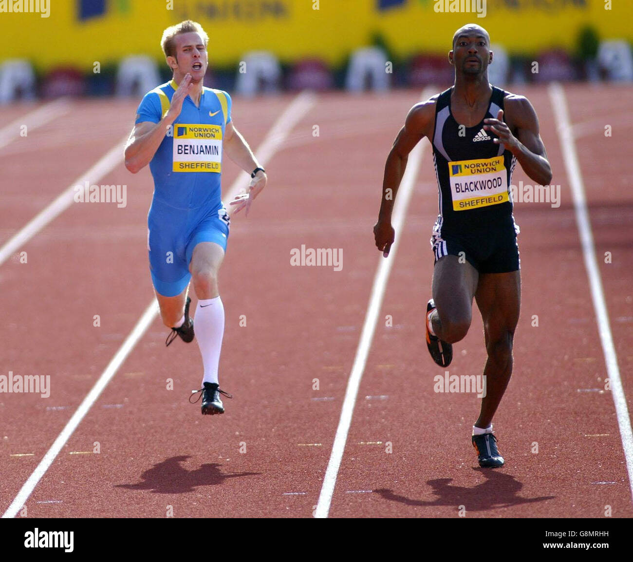 Great Britain's Tim Benjamin (L) finishes behind Jamaica's Michael ...