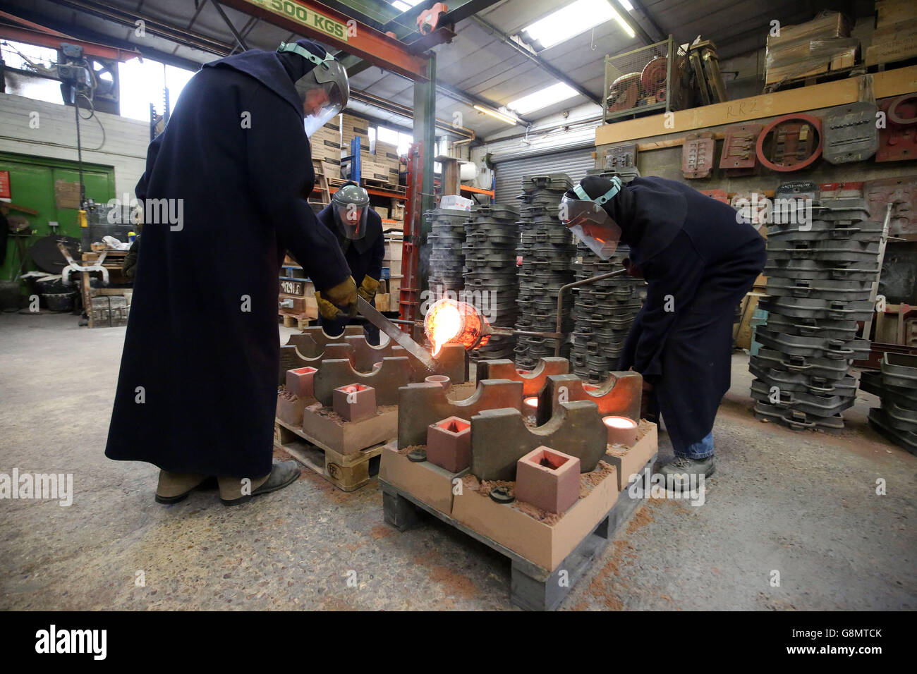 Hot metal is poured into sand casts to make the BAFTA masks at New Pro ...
