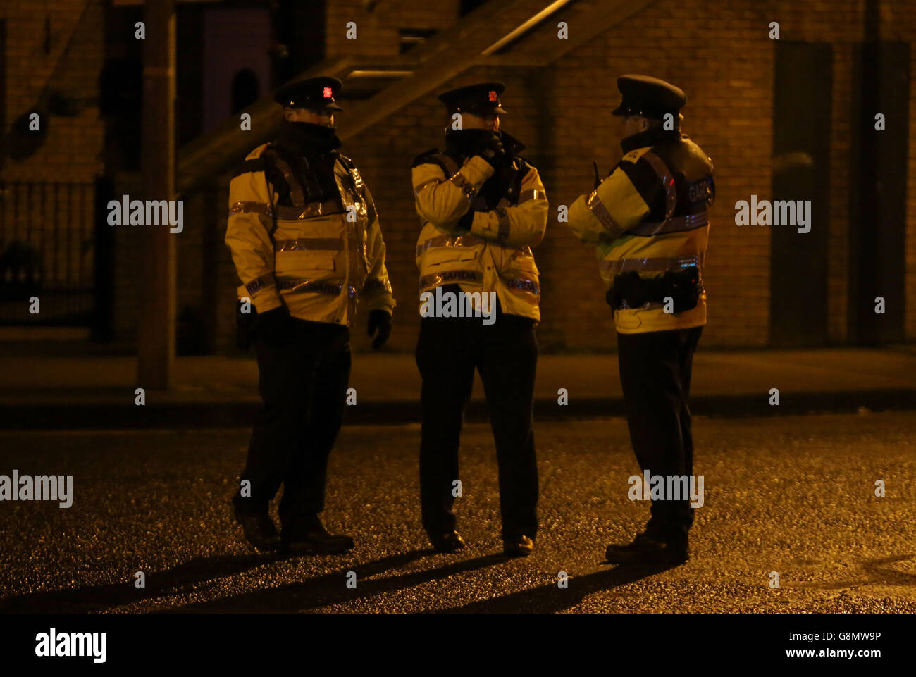 Garda officers attend scene on poplar row hi-res stock photography and ...