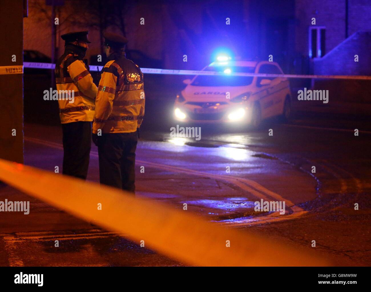 Garda officers attend the scene on Poplar Row, North Strand following ...