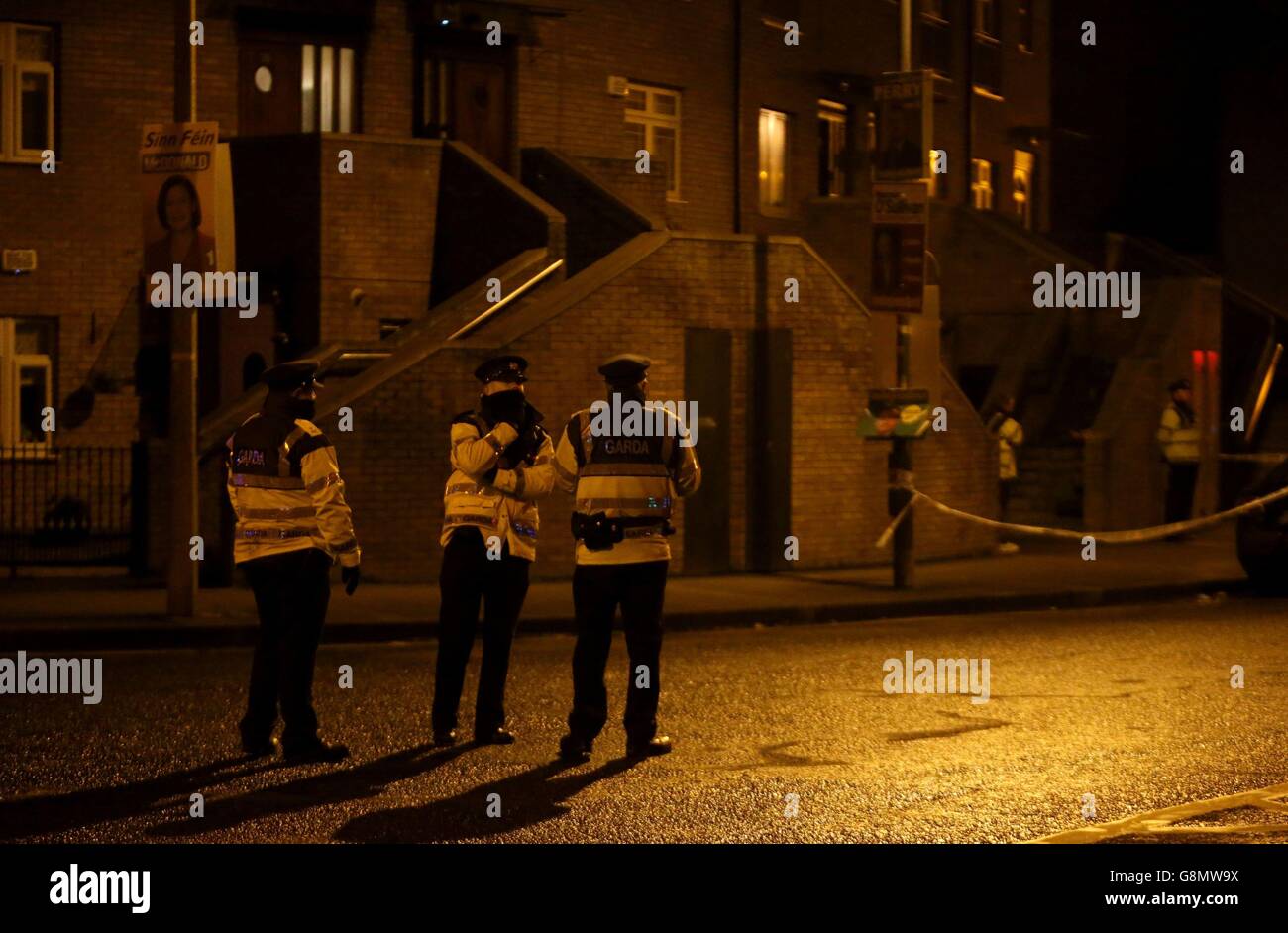 Garda officers attend the scene on Poplar Row, North Strand following ...