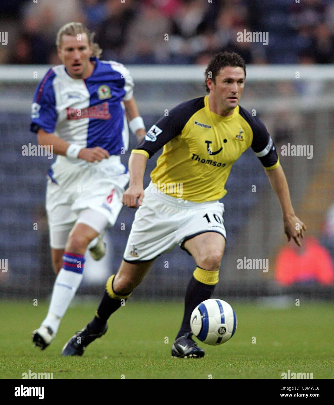 Tottenham Hotspur's Robbie Keane (R) breaks clear of Blackburn Rovers ...