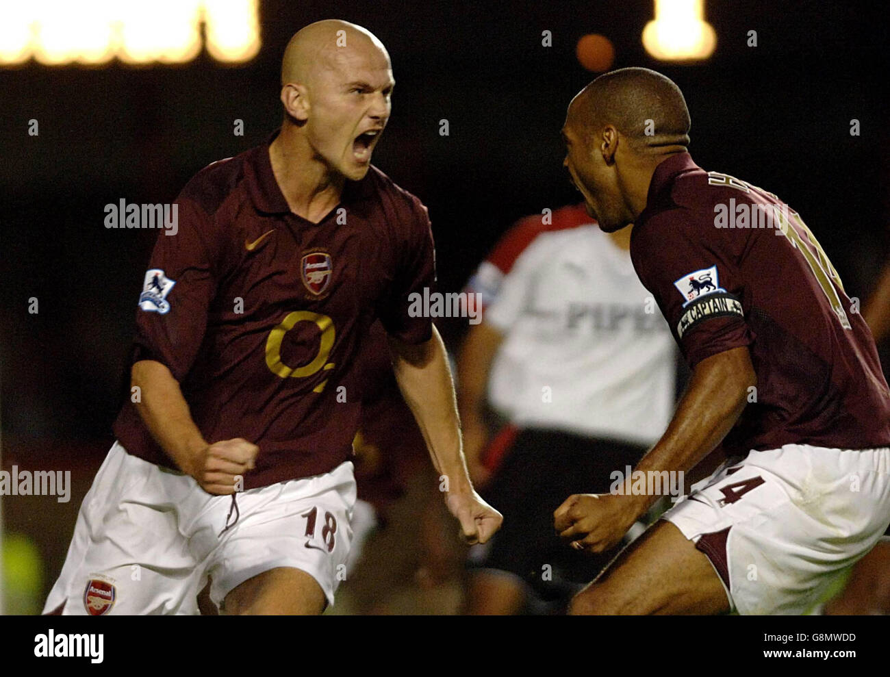 Arsenal's Pascal Cygan (L) celebrates scoring against Fulham with ...