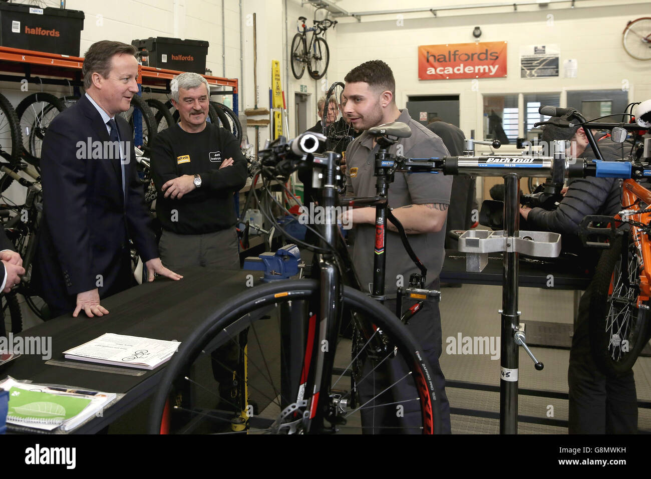 Prime Minister David Cameron talks to inmate Chris (right) inside the ...