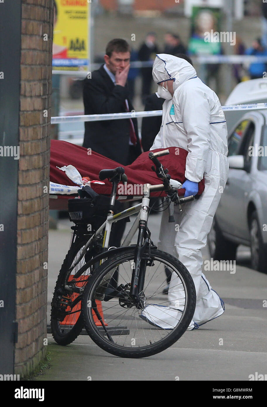 The body of Eddie Hutch is removed from a property in Poplar Row in ...