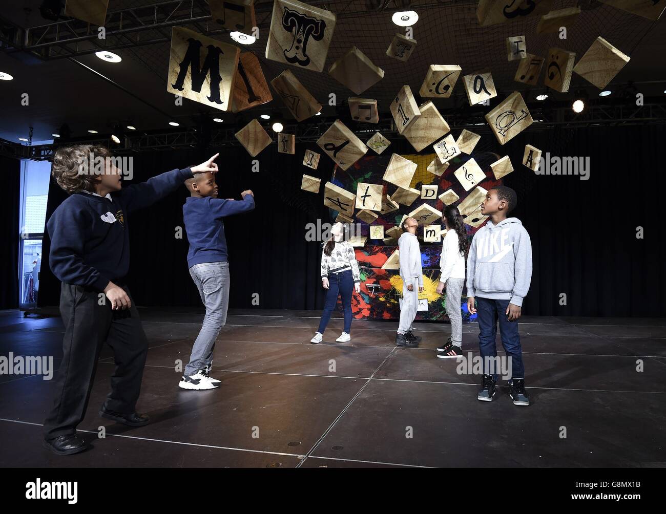 Children explore the 'Crunchem Catchem Spellem' giant satchel ...