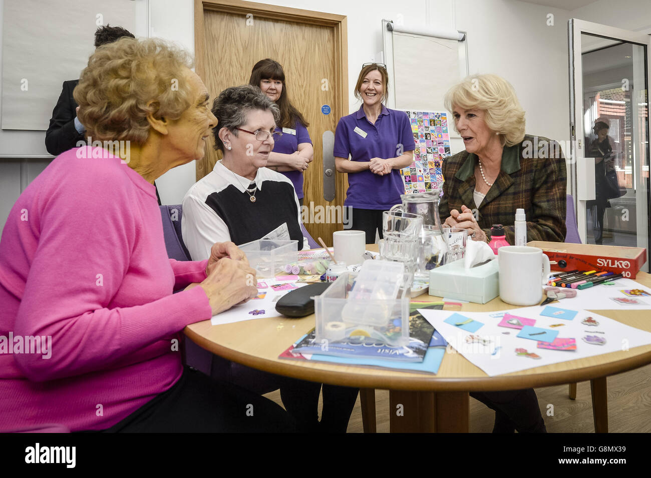 The Duchess of Cornwall talks with patients Jean Sheppard (left) and ...