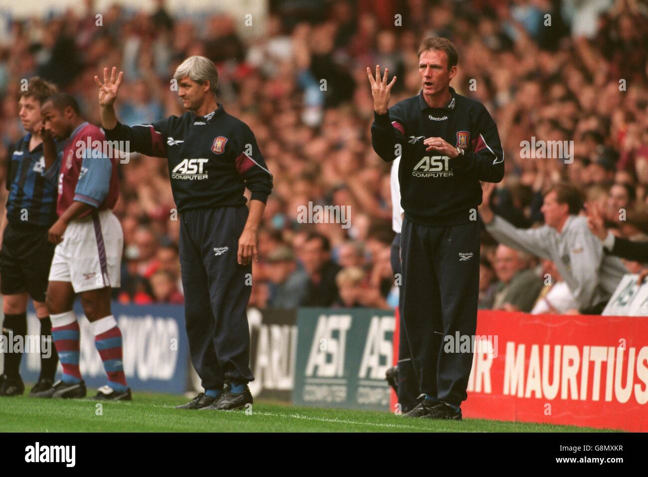 Aston Villa manager Brian Little (centre) and his assistant Alan Evans ...