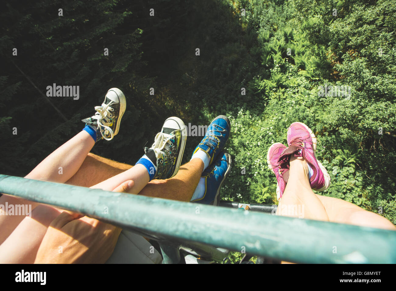Up in a chair lift above the mountains Stock Photo - Alamy