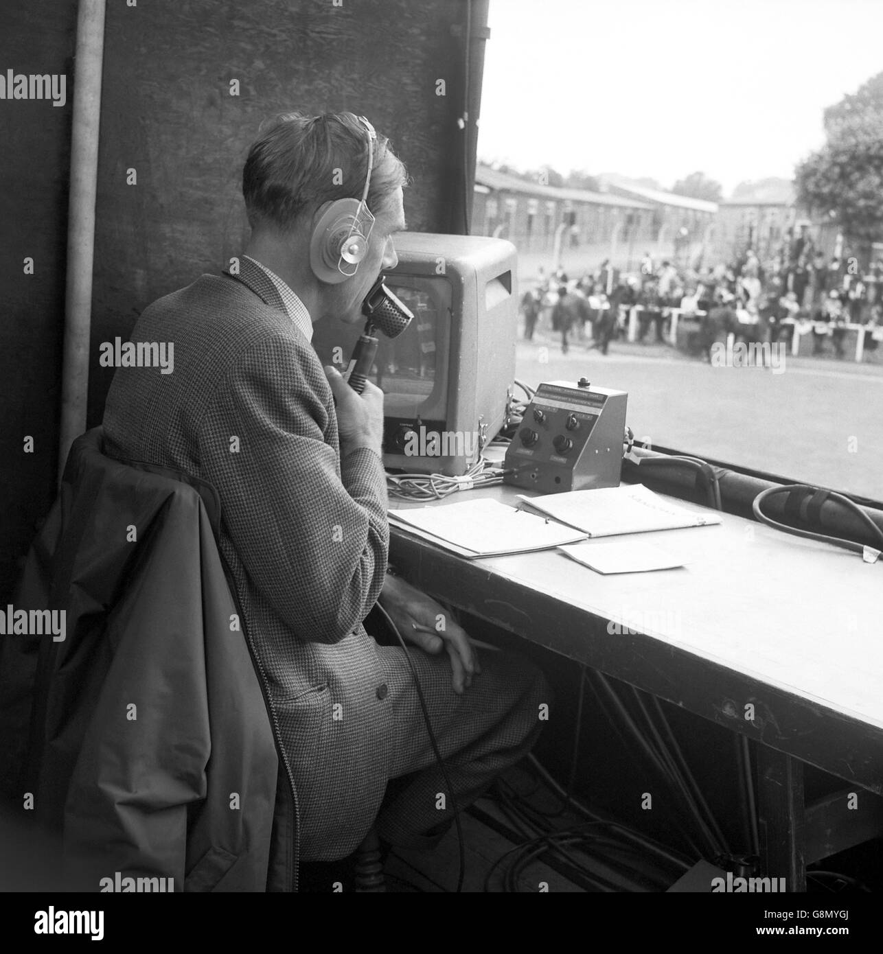 Race announcer commentator desk sandown park racecourse Black and White ...