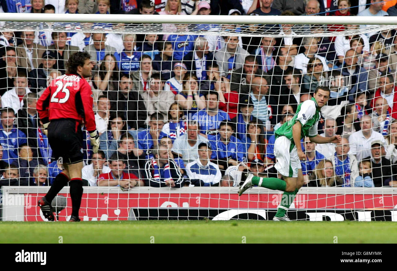 Hibernian's Ivan Sproule (R) runs away to celebrate his goal against ...