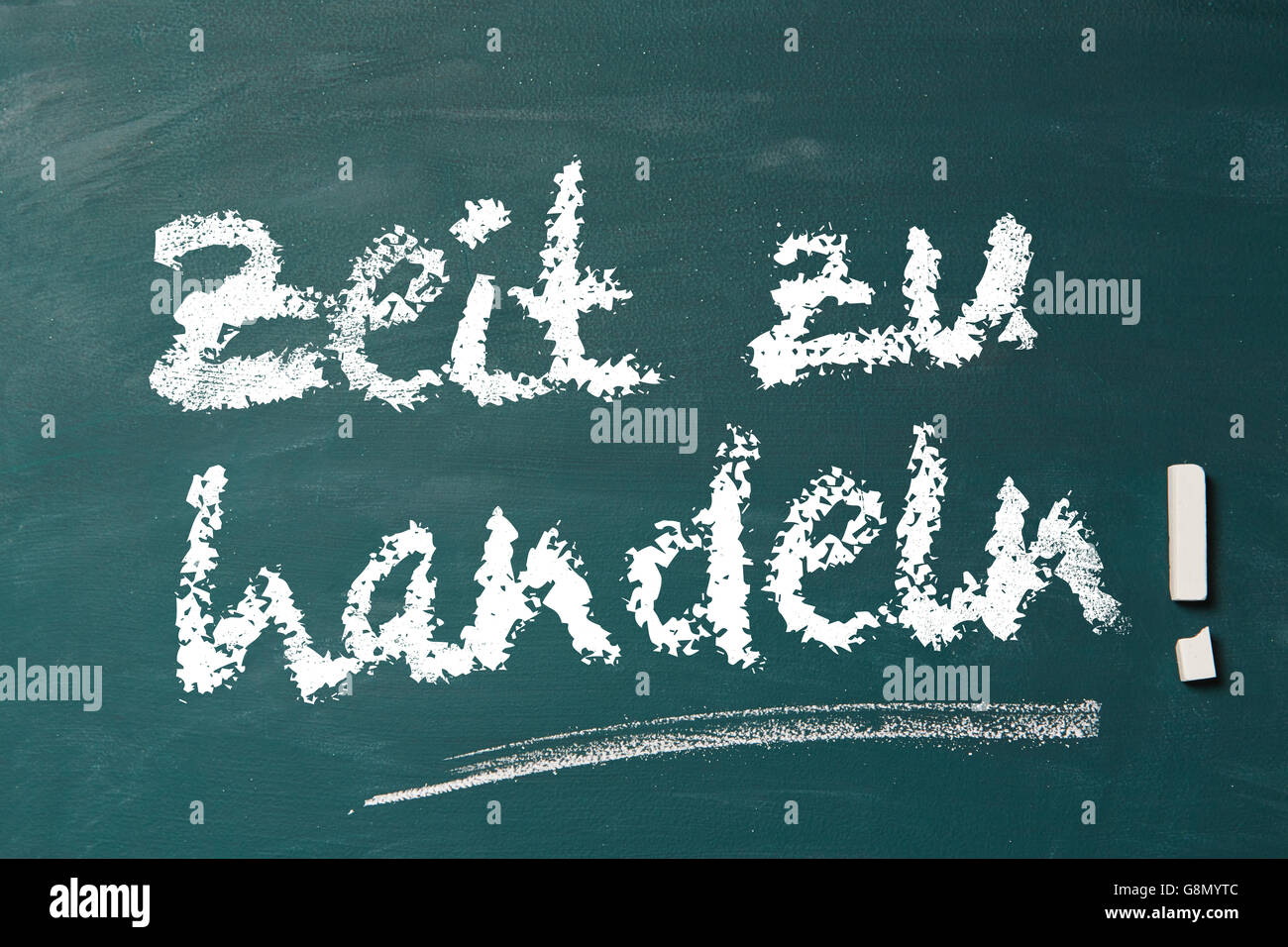 German expression "Zeit zu handeln!" (Time to act!) on blackboard Stock ...