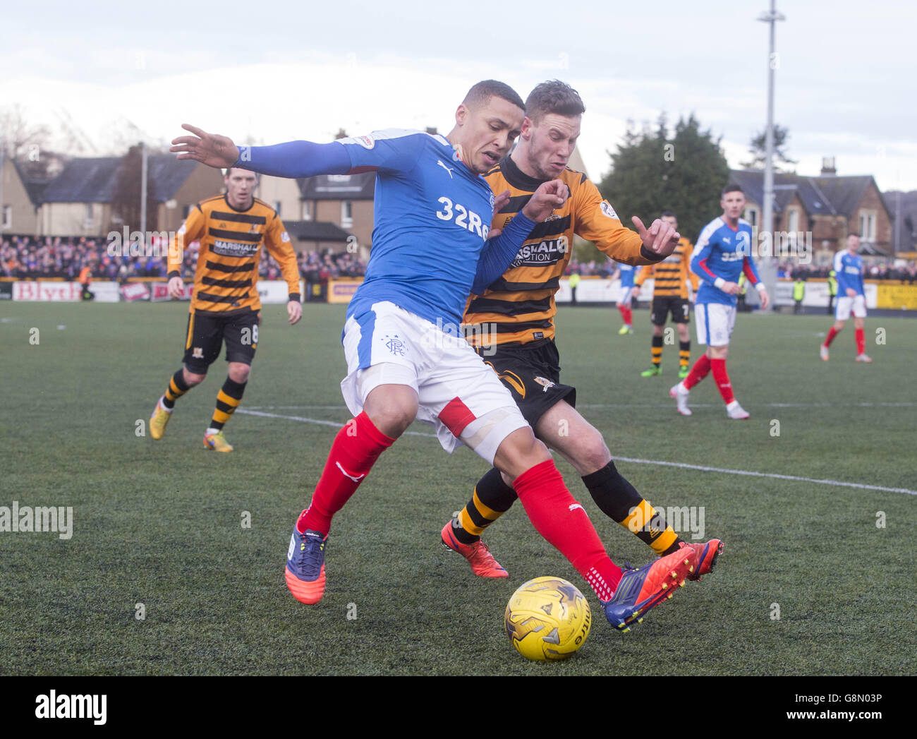 Rangers' James Tavernier (left) and Alloa's Mitch Megginson (right ...