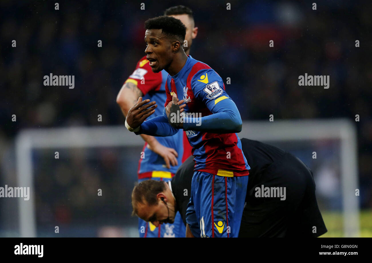 Crystal Palace's Wilfried Zaha reacts to fans chanting during the ...