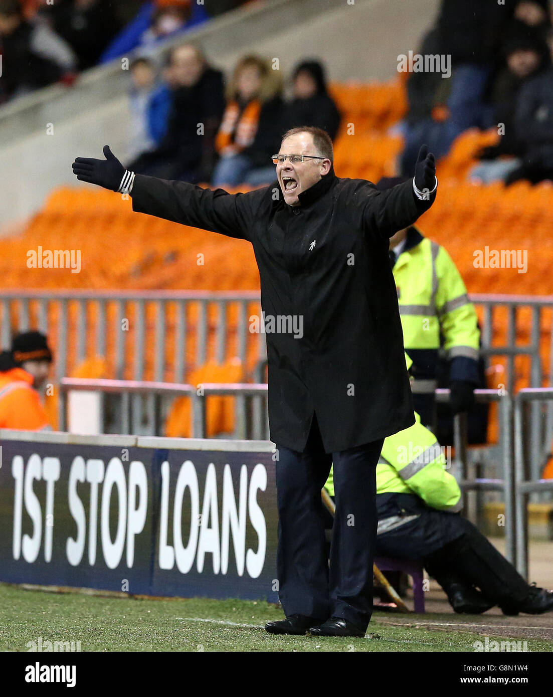 Blackpool Manager Neil McDonald gives instructions from the touchline ...