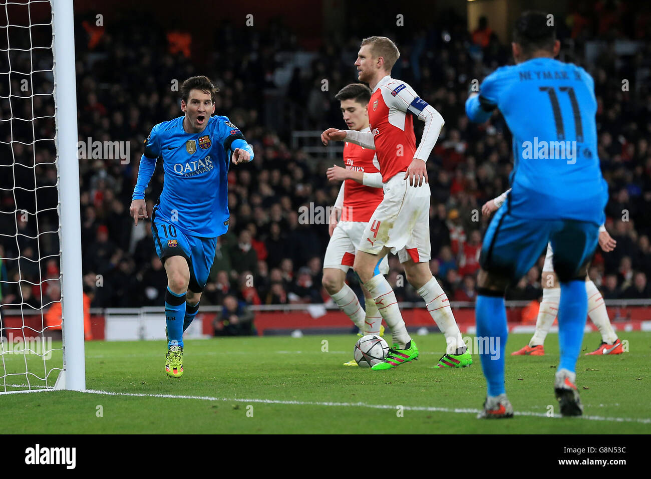 Barcelona's Lionel Messi celebrates (left) after scoring his sides ...
