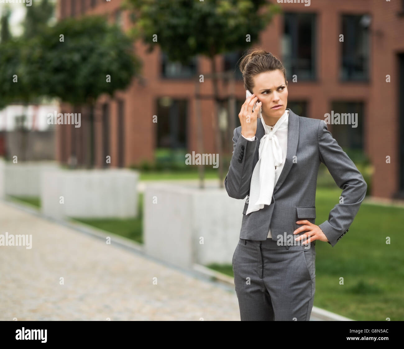 Worried business woman outdoors hi-res stock photography and images - Alamy