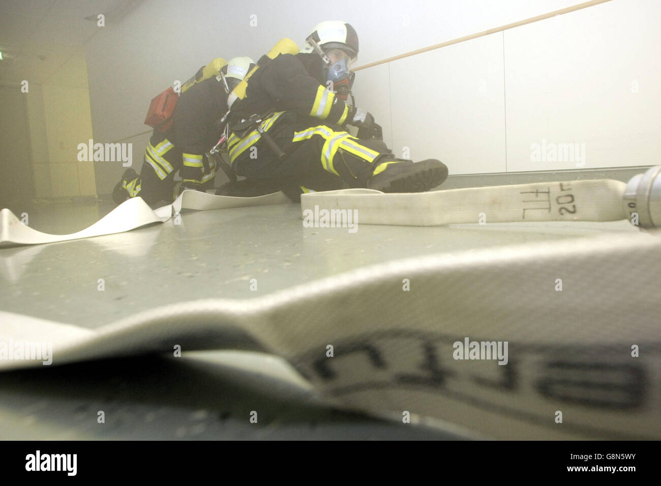 Firefighters training indoors hi-res stock photography and images - Alamy