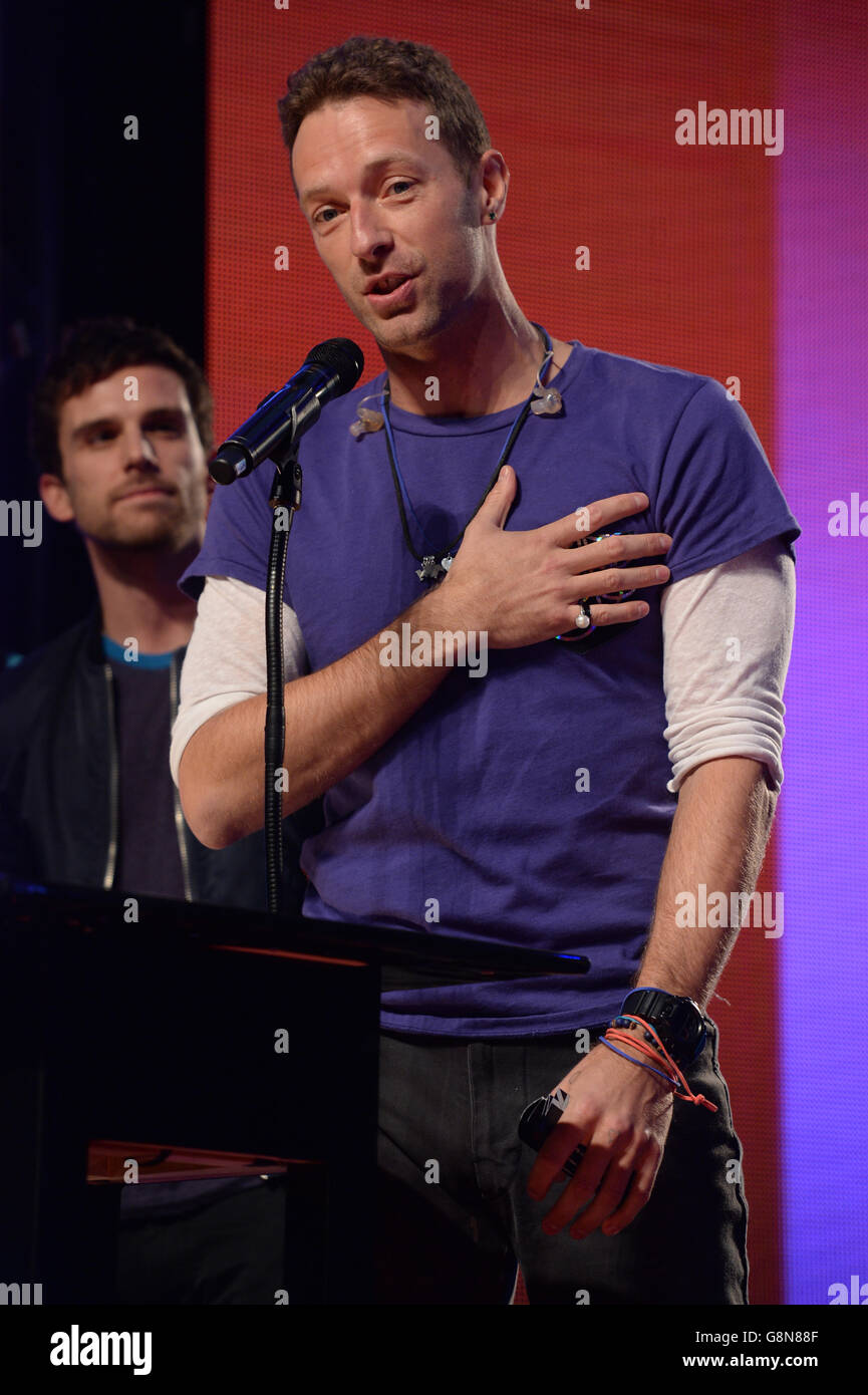 Chris Martin of Coldplay collects the Godlike Genius Award during the ...